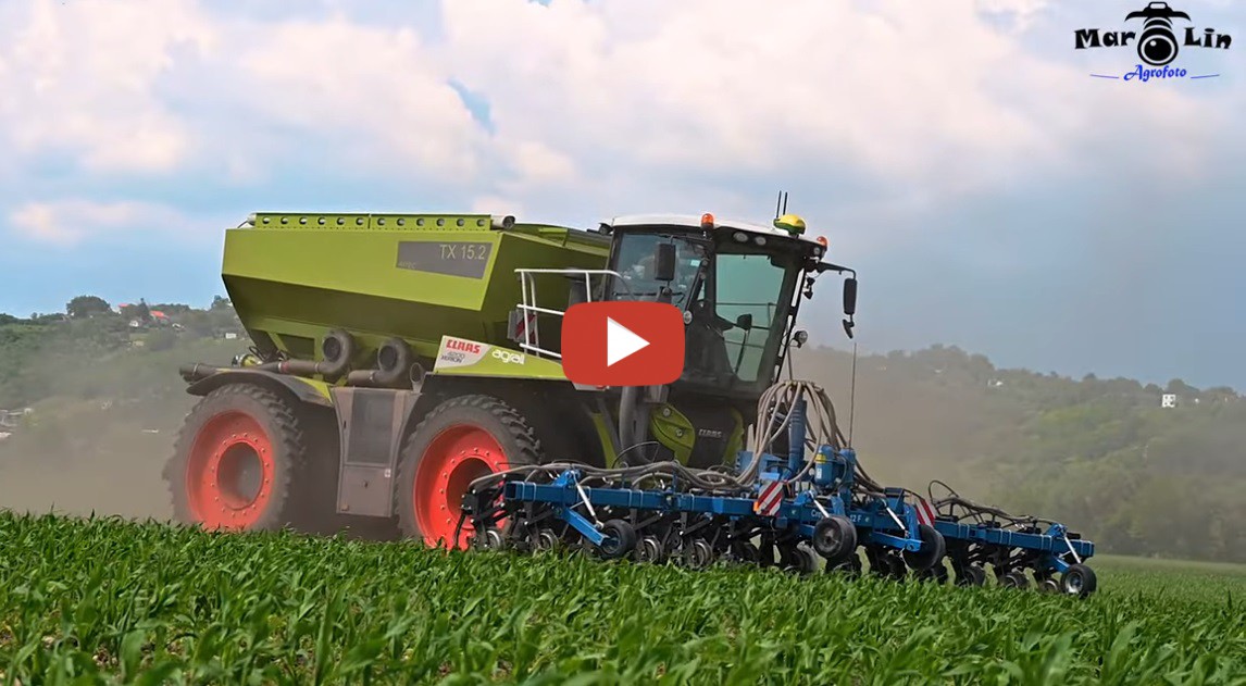 Claas XERION 4200 mit Aufbau zur Ausbringung von Dünger und Grubber ...